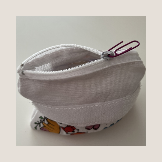 How to open the Ouchie Pouchie child safe zip? – MamaFox